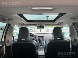 White Volvo XC60 2014 in Riga, with an engine capacity of 2.00 L and mileage of 170 thousand km for 9500 €, photo 11 on AUTOMOTO.COM.LV