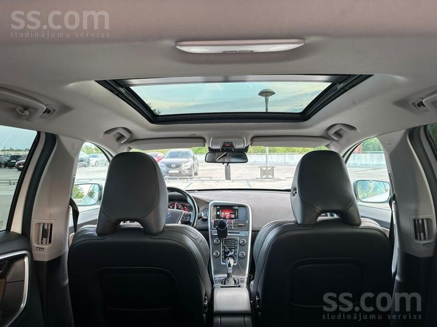 White Volvo XC60 2014 in Riga, with an engine capacity of 2.00 L and mileage of 170 thousand km for 9500 €, photo 11 on AUTOMOTO.COM.LV