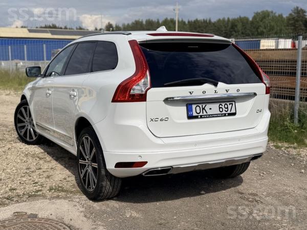 White Volvo XC60 2014 in Riga, with an engine capacity of 2.00 L and mileage of 255 thousand km for 11995 €, photo 3 on AUTOMOTO.COM.LV