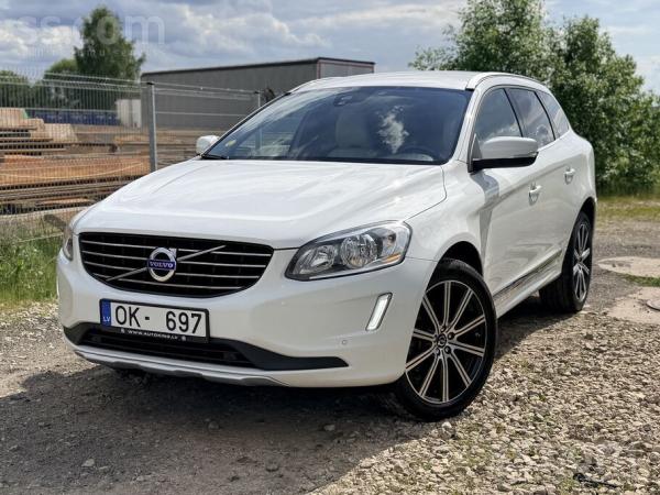 White Volvo XC60 2014 in Riga, with an engine capacity of 2.00 L and mileage of 255 thousand km for 11995 €, photo 4 on AUTOMOTO.COM.LV