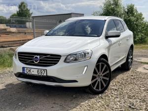 White Volvo XC60 2014 in Riga, with an engine capacity of 2.00 L and mileage of 255 thousand km for 11995 €, photo 5 on AUTOMOTO.COM.LV