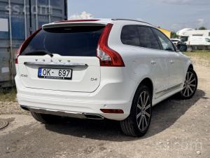 White Volvo XC60 2014 in Riga, with an engine capacity of 2.00 L and mileage of 255 thousand km for 11995 €, photo 6 on AUTOMOTO.COM.LV