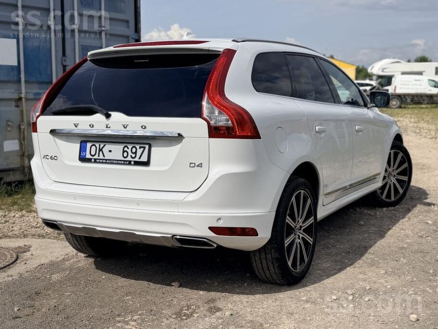 White Volvo XC60 2014 in Riga, with an engine capacity of 2.00 L and mileage of 255 thousand km for 11995 €, photo 6 on AUTOMOTO.COM.LV