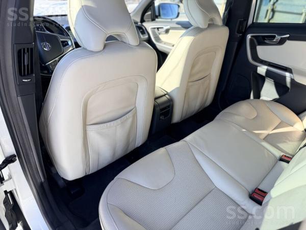 White Volvo XC60 2014 in Riga, with an engine capacity of 2.00 L and mileage of 255 thousand km for 11995 €, photo 9 on AUTOMOTO.COM.LV