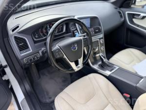 White Volvo XC60 2014 in Riga, with an engine capacity of 2.00 L and mileage of 255 thousand km for 11995 €, photo 11 on AUTOMOTO.COM.LV