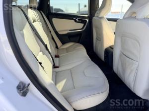White Volvo XC60 2014 in Riga, with an engine capacity of 2.00 L and mileage of 255 thousand km for 11995 €, photo 23 on AUTOMOTO.COM.LV