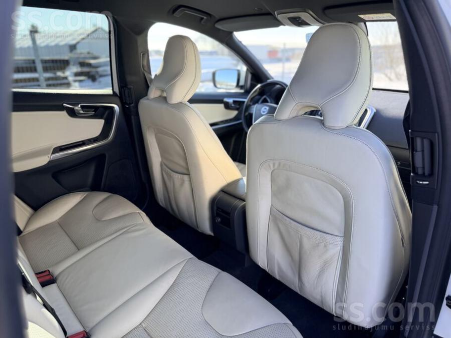 White Volvo XC60 2014 in Riga, with an engine capacity of 2.00 L and mileage of 255 thousand km for 11995 €, photo 24 on AUTOMOTO.COM.LV