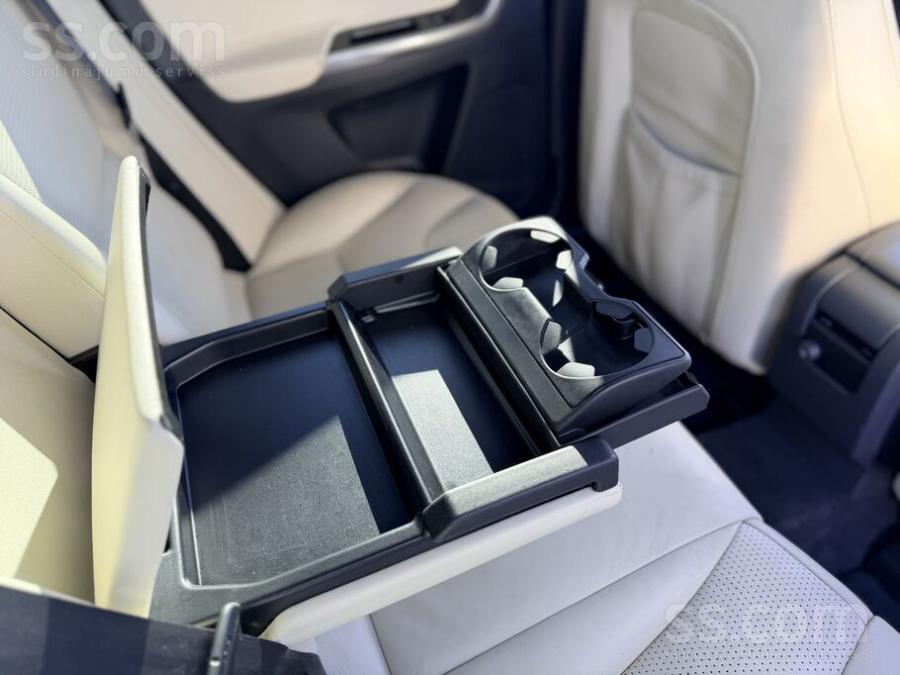 White Volvo XC60 2014 in Riga, with an engine capacity of 2.00 L and mileage of 255 thousand km for 11995 €, photo 25 on AUTOMOTO.COM.LV