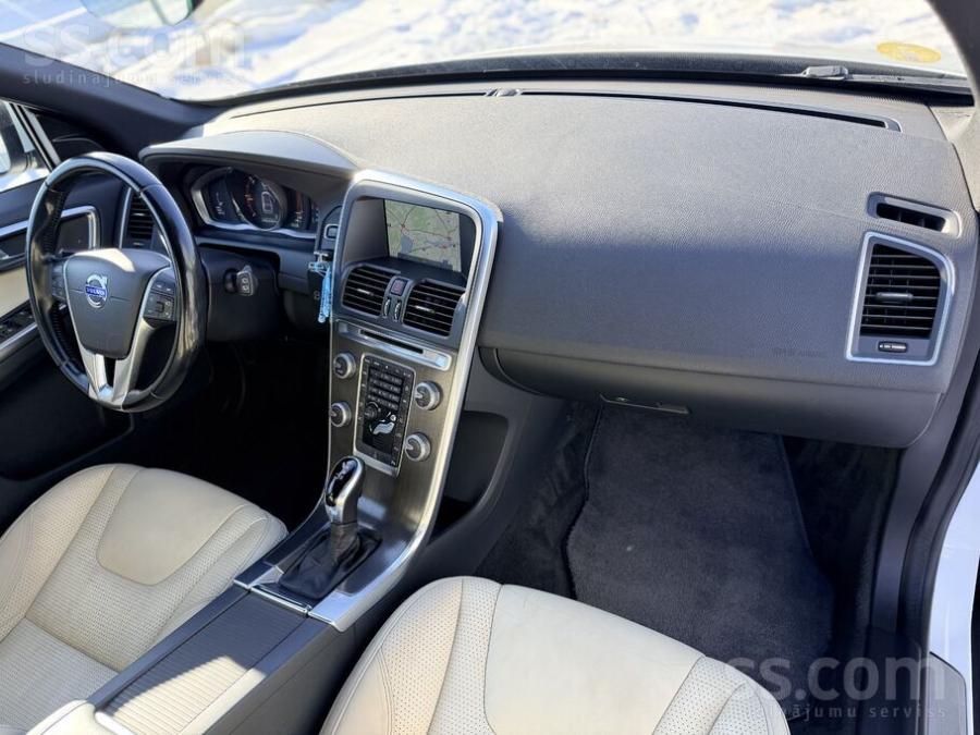White Volvo XC60 2014 in Riga, with an engine capacity of 2.00 L and mileage of 255 thousand km for 11995 €, photo 29 on AUTOMOTO.COM.LV