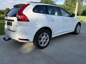 White Volvo XC60 2014 in Kazlu Ruda, with an engine capacity of 1.97 L and mileage of 317 thousand km for 7999 €, photo 4 on AUTOMOTO.COM.LV