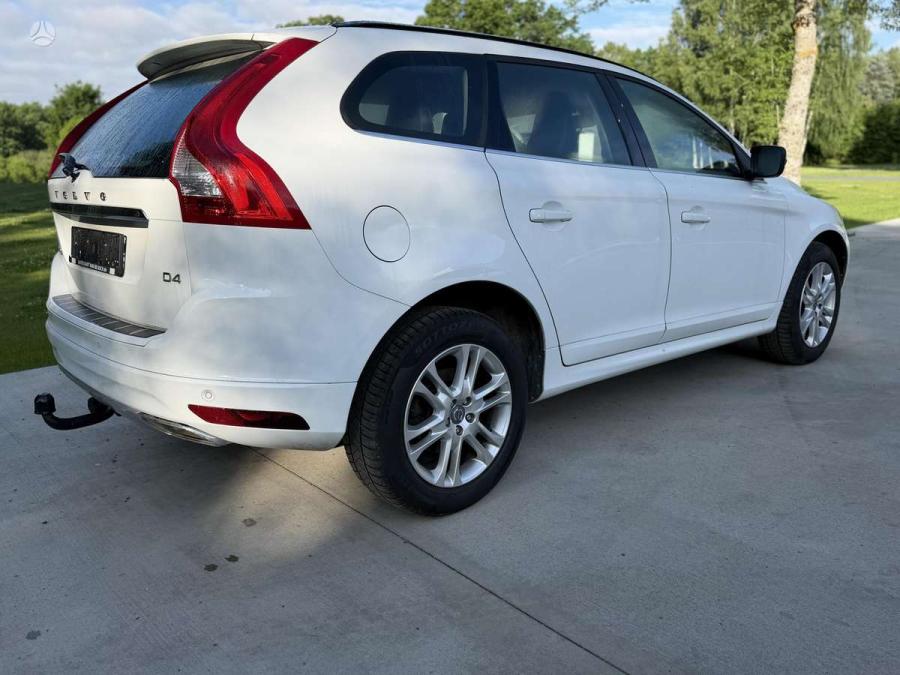 White Volvo XC60 2014 in Kazlu Ruda, with an engine capacity of 1.97 L and mileage of 317 thousand km for 7999 €, photo 4 on AUTOMOTO.COM.LV