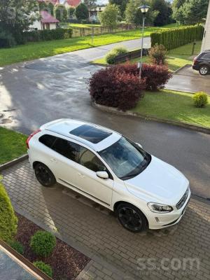 White Volvo XC60 2014 in Riga, with an engine capacity of 2.40 L and mileage of 249 thousand km for 14000 €, photo  on AUTOMOTO.COM.LV