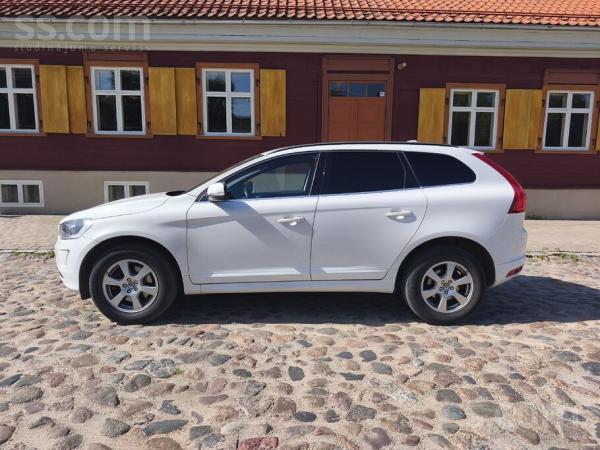 White Volvo XC60 2014 in Jelgava, with an engine capacity of 2.00 L and mileage of 0 thousand km for 8590 €, photo 8 on AUTOMOTO.COM.LV