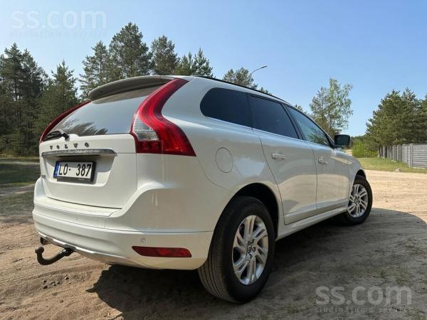 White Volvo XC60 2014 in Riga, with an engine capacity of 2.00 L and mileage of 0 thousand km for 8750 €, photo 4 on AUTOMOTO.COM.LV
