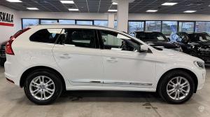 White Volvo XC60 2014 in Klaipeda, with an engine capacity of 1.97 L and mileage of 240 thousand km for 14900 €, photo 14 on AUTOMOTO.COM.LV