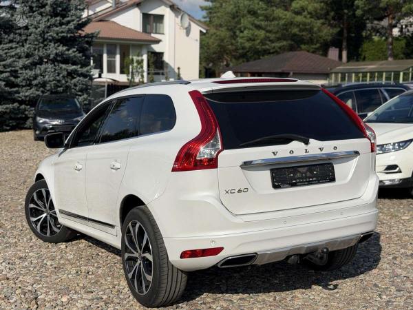 White Volvo XC60 2014 in Utena, with an engine capacity of 2.40 L and mileage of 280 thousand km for 8390 €, photo 4 on AUTOMOTO.COM.LV