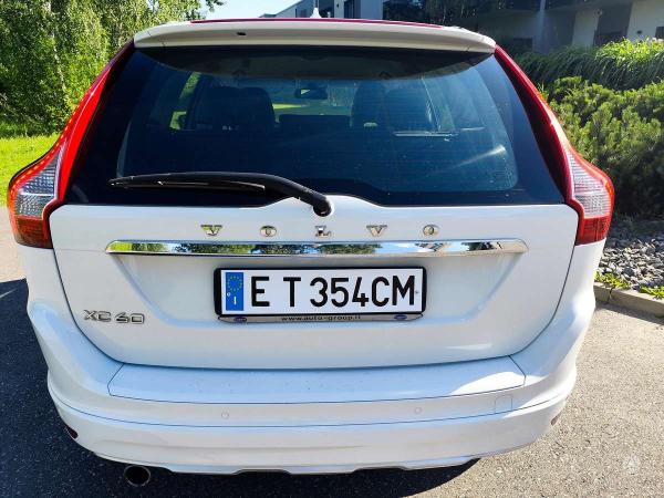 White Volvo XC60 2014 in Kaunas, with an engine capacity of 1.98 L and mileage of 250 thousand km for 10250 €, photo 6 on AUTOMOTO.COM.LV
