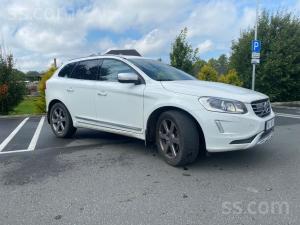 White Volvo XC60 2014 in Riga, with an engine capacity of 2.40 L and mileage of 300 thousand km for 13000 €, photo 4 on AUTOMOTO.COM.LV