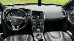 White Volvo XC60 2014 in Riga, with an engine capacity of 2.40 L and mileage of 300 thousand km for 13000 €, photo 6 on AUTOMOTO.COM.LV
