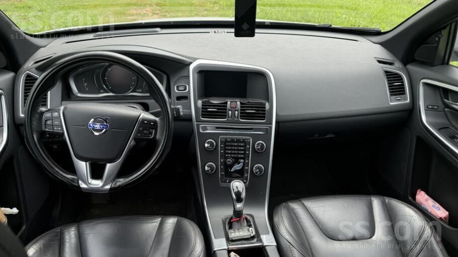 White Volvo XC60 2014 in Riga, with an engine capacity of 2.40 L and mileage of 300 thousand km for 13000 €, photo 6 on AUTOMOTO.COM.LV