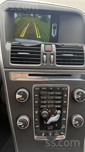 White Volvo XC60 2014 in Riga, with an engine capacity of 2.40 L and mileage of 300 thousand km for 13000 €, photo 7 on AUTOMOTO.COM.LV