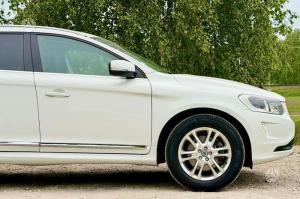 White Volvo XC60 2014 in Siauliai, with an engine capacity of 1.97 L and mileage of 250 thousand km for 11550 €, photo 11 on AUTOMOTO.COM.LV