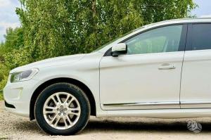 White Volvo XC60 2014 in Siauliai, with an engine capacity of 1.97 L and mileage of 250 thousand km for 11550 €, photo 12 on AUTOMOTO.COM.LV