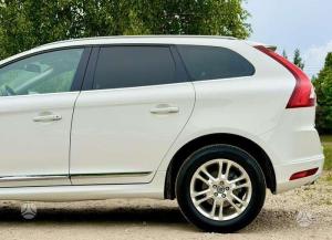 White Volvo XC60 2014 in Siauliai, with an engine capacity of 1.97 L and mileage of 250 thousand km for 11550 €, photo 13 on AUTOMOTO.COM.LV