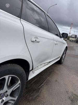 White Volvo XC60 2014 in Klaipeda, with an engine capacity of 2.95 L and mileage of 280 thousand km for 6799 €, photo 11 on AUTOMOTO.COM.LV