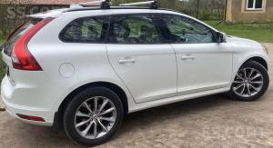 White Volvo XC60 2014 in Riga, with an engine capacity of 2.00 L and mileage of 270 thousand km for 9000 €, photo 4 on AUTOMOTO.COM.LV