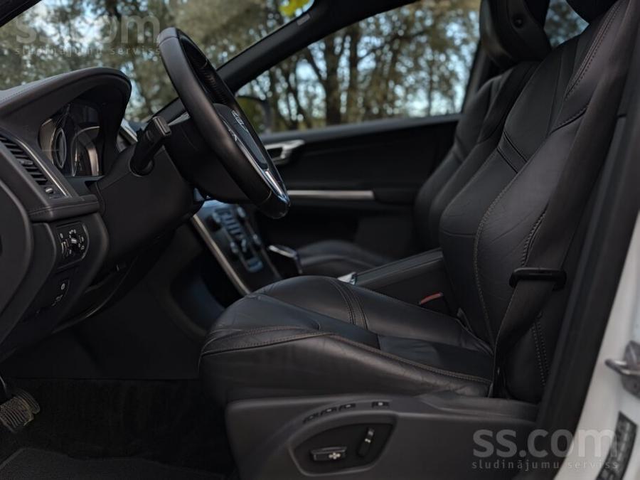 White Volvo XC60 2014 in Riga, with an engine capacity of 2.40 L and mileage of 0 thousand km for 12990 €, photo 18 on AUTOMOTO.COM.LV