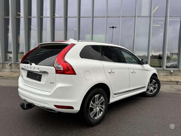 White Volvo XC60 2015 in Vilnius, with an engine capacity of 1.97 L and mileage of 270 thousand km for 12800 €, photo 5 on AUTOMOTO.COM.LV