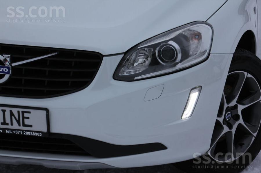 White Volvo XC60 2015 in Tukums, with an engine capacity of 2.00 L and mileage of 204 thousand km for 11990 €, photo 12 on AUTOMOTO.COM.LV