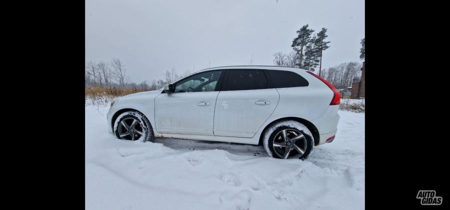 White Volvo XC60 2015 in Vilnius, with an engine capacity of 2.40 L and mileage of 451 thousand km for 13999 €, photo 8 on AUTOMOTO.COM.LV
