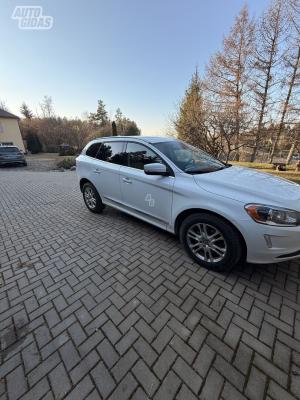 White Volvo XC60 2015 in Prienai, with an engine capacity of 2.50 L and mileage of 260 thousand km for 12000 €, photo 4 on AUTOMOTO.COM.LV
