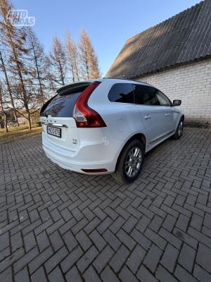 White Volvo XC60 2015 in Prienai, with an engine capacity of 2.50 L and mileage of 260 thousand km for 12000 €, photo 7 on AUTOMOTO.COM.LV
