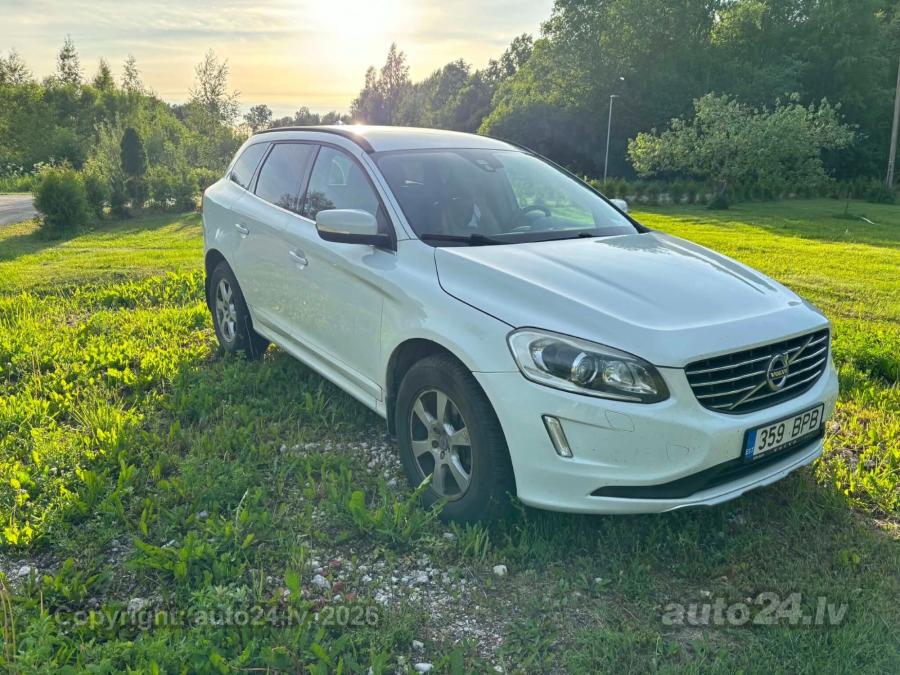 White Volvo XC60 2015 in Tallinn, with an engine capacity of 2.40 L and mileage of 212 thousand km for 12000 €, photo 4 on AUTOMOTO.COM.LV