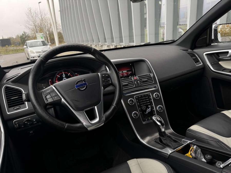 White Volvo XC60 2015 in Vilnius, with an engine capacity of 1.98 L and mileage of 270 thousand km for 11300 €, photo 13 on AUTOMOTO.COM.LV