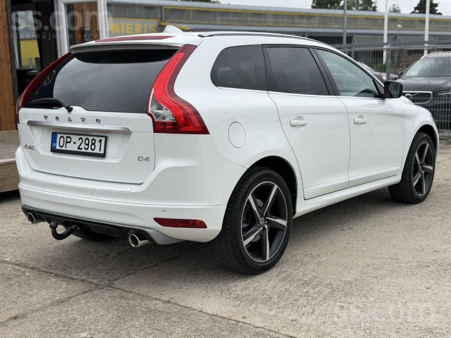 White Volvo XC60 2015 in Riga, with an engine capacity of 2.00 L and mileage of 217 thousand km for 13900 €, photo 19 on AUTOMOTO.COM.LV