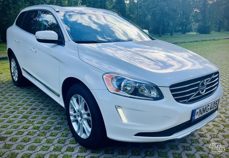 White Volvo XC60 2015 in Vilnius, with an engine capacity of 2.50 L and mileage of 247 thousand km for 10800 €, photo 3 on AUTOMOTO.COM.LV