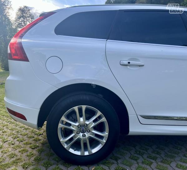 White Volvo XC60 2015 in Vilnius, with an engine capacity of 2.50 L and mileage of 247 thousand km for 10800 €, photo 5 on AUTOMOTO.COM.LV
