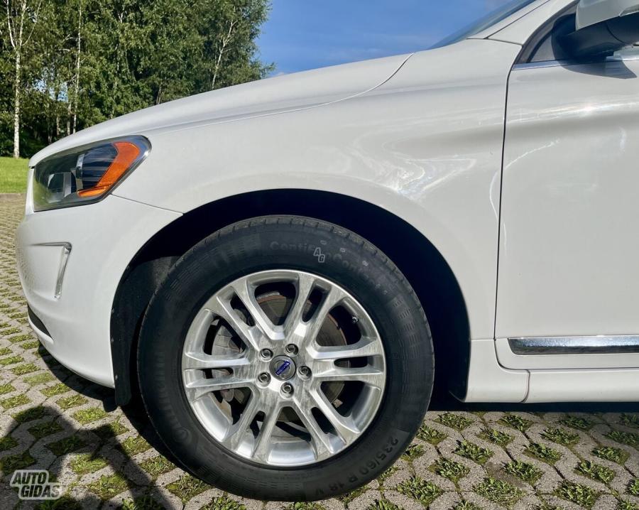 White Volvo XC60 2015 in Vilnius, with an engine capacity of 2.50 L and mileage of 247 thousand km for 10800 €, photo 14 on AUTOMOTO.COM.LV
