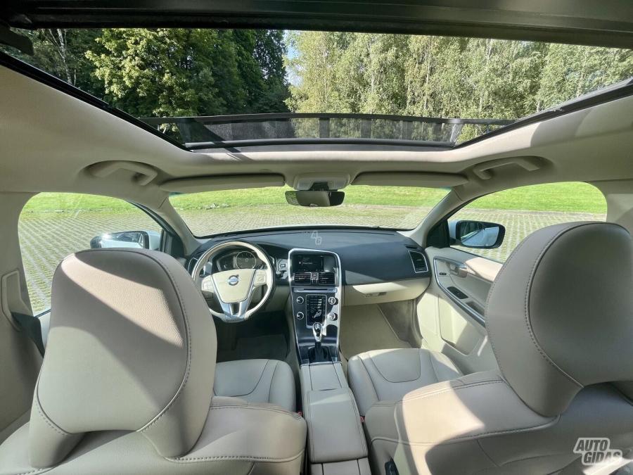 White Volvo XC60 2015 in Vilnius, with an engine capacity of 2.50 L and mileage of 247 thousand km for 10800 €, photo 16 on AUTOMOTO.COM.LV