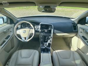 White Volvo XC60 2015 in Vilnius, with an engine capacity of 2.50 L and mileage of 247 thousand km for 10800 €, photo 17 on AUTOMOTO.COM.LV
