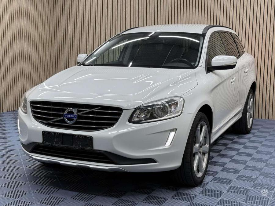 White Volvo XC60 2015 in Marijampole, with an engine capacity of 2.40 L and mileage of 229 thousand km for 12799 €, photo 5 on AUTOMOTO.COM.LV