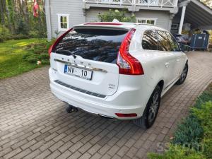 White Volvo XC60 2015 in Riga, with an engine capacity of 2.40 L and mileage of 185 thousand km for 14800 €, photo 4 on AUTOMOTO.COM.LV