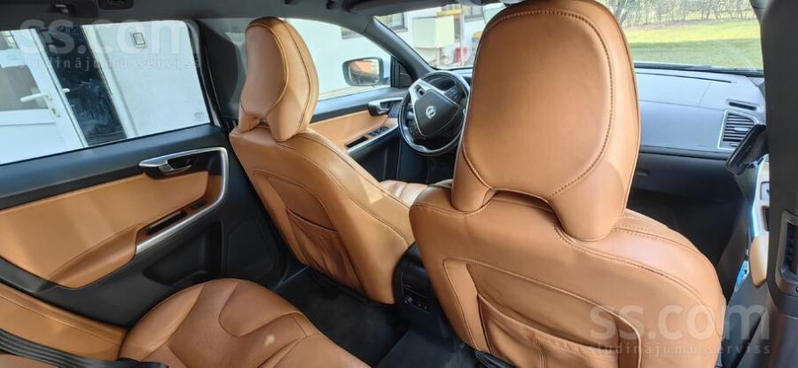 White Volvo XC60 2015 in Riga, with an engine capacity of 2.40 L and mileage of 185 thousand km for 14800 €, photo 7 on AUTOMOTO.COM.LV