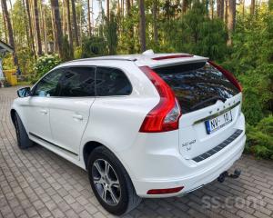 White Volvo XC60 2015 in Riga, with an engine capacity of 2.40 L and mileage of 185 thousand km for 14800 €, photo 13 on AUTOMOTO.COM.LV