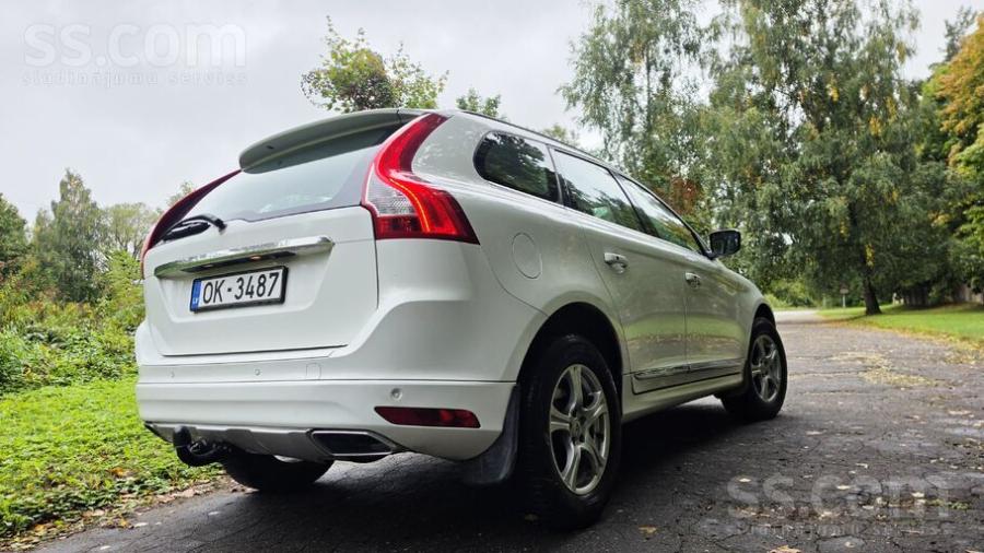White Volvo XC60 2015 in Riga, with an engine capacity of 2.00 L and mileage of 300 thousand km for 7000 €, photo 4 on AUTOMOTO.COM.LV