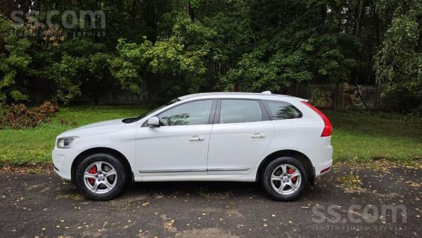White Volvo XC60 2015 in Riga, with an engine capacity of 2.00 L and mileage of 300 thousand km for 7000 €, photo 7 on AUTOMOTO.COM.LV